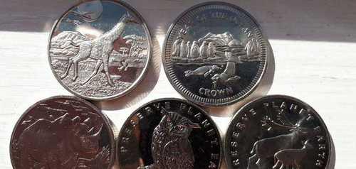 5 монет кронового размера с животными