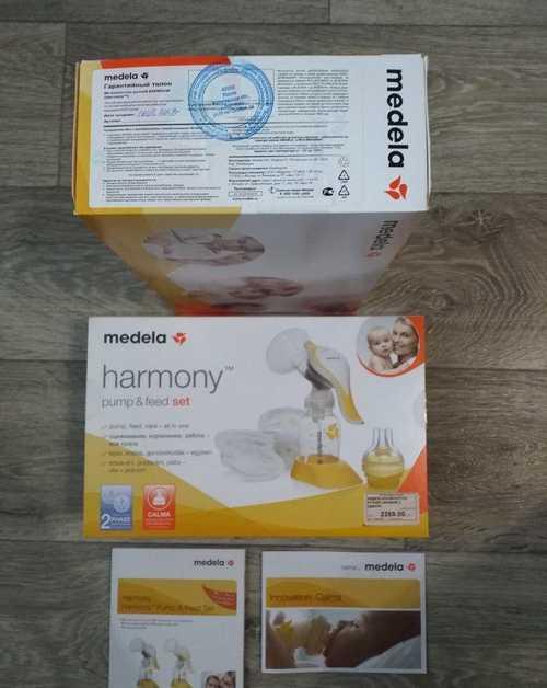 Молокоотсос Medela+крем purelan 100+накладки