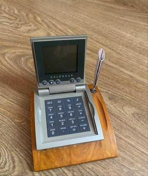 Часы с калькулятором и ручкой