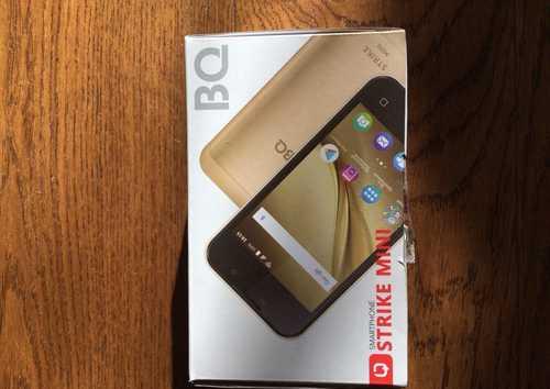 Телефон BQ strike mini (smartphone)