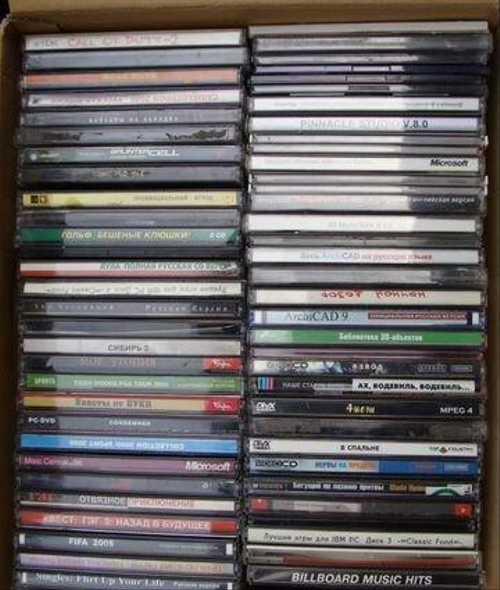 CD и DVD с играми и фильмами 90-х и 00-х