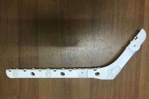 Кронштейн заднего бампера левый Nissan Almera G15