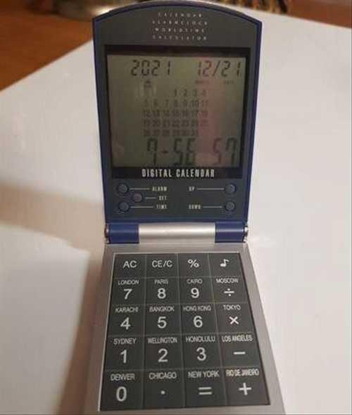 Портативный калькулятор календарь будильник часы