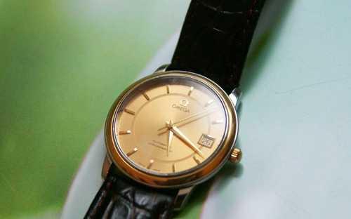 Omega Deville Prestige сталь/золото cal.1120