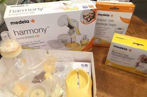 Молокоотсос ручной Medela Harmony + соска Calma +