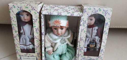 Набор из трех фарфоровых кукол