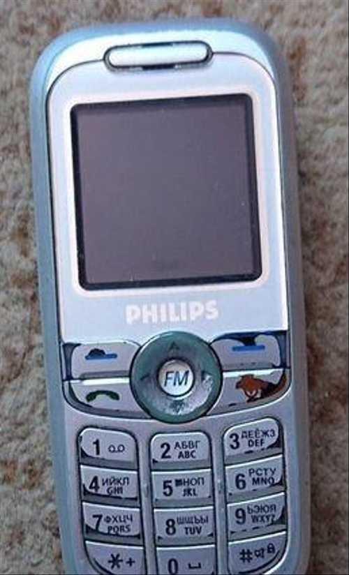 Мобильный телефон Philips + Устройство для зарядки
