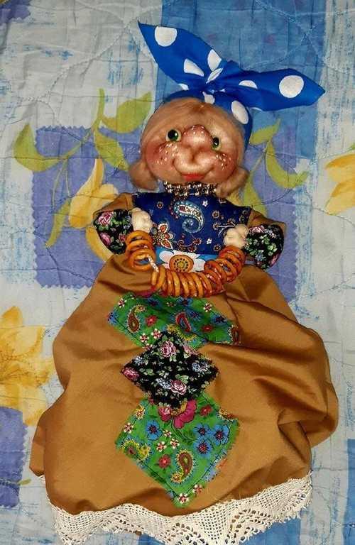 Текстильная кукла Пакетница