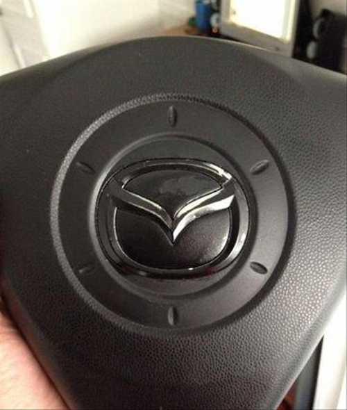 Значок на руль mazda 3