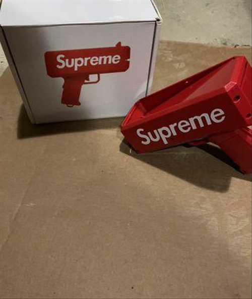 Денежный пистолет supreme