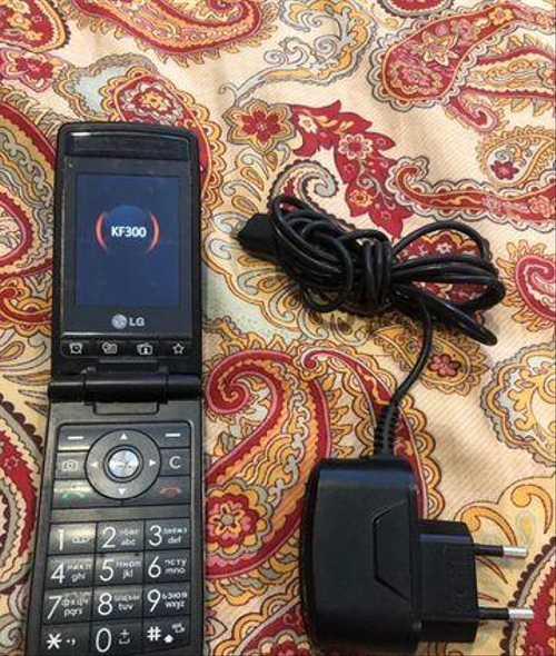 Мобильный телефон раскладушка LG KF300