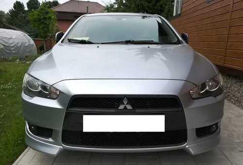 Клыки переднего бампера Mitsubishi Lancer X