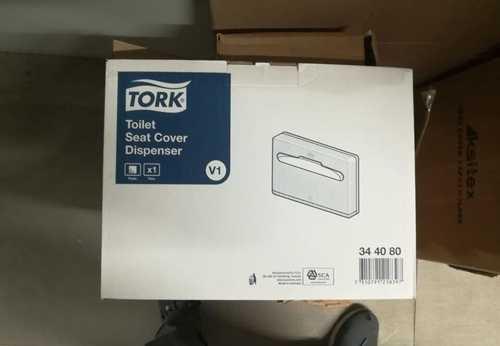 Tork диспенсер для бумажных покрытий на унитаз