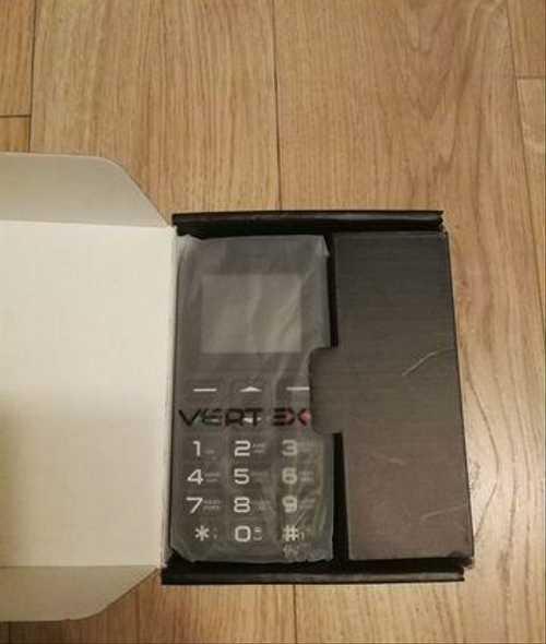 Мобильный телефон vertex