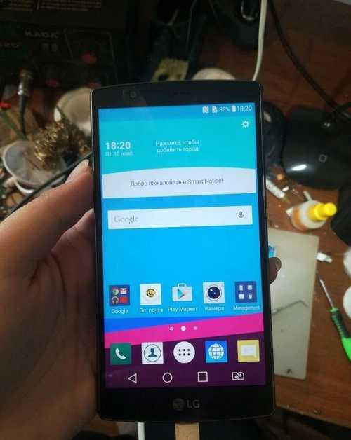 Телефон LG G4 чёрный кожа