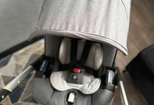 Коляска автокресло Doona с базой Isofix