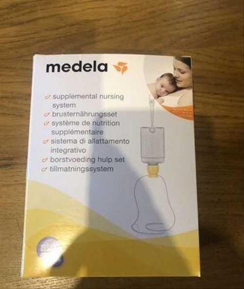 Система докорма Medela SNS