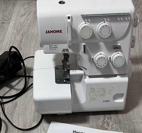 Оверлок Janome 210d