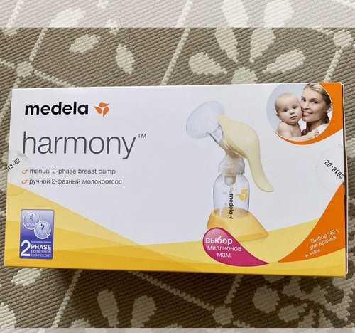 Молокоотсос medela ручной  соска Medela Calma