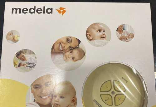 Электрический молокоотсос Medela