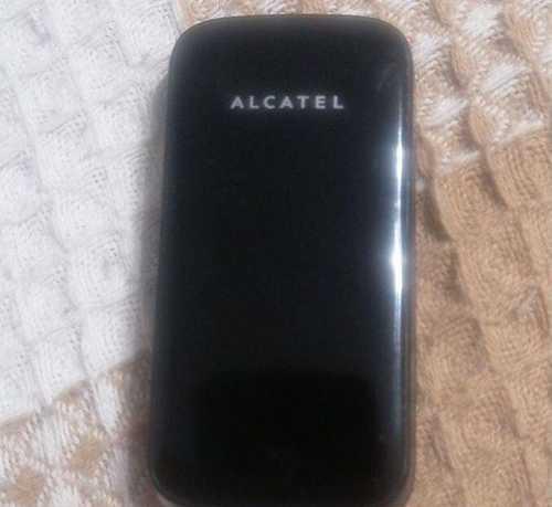 Кнопочный раскладной телефон Alcatel