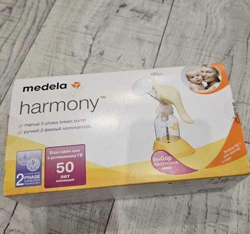 Молокоотсос medela ручной