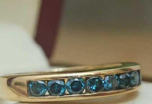 Золотое кольцо 750 проба с голубыми бриллиантами