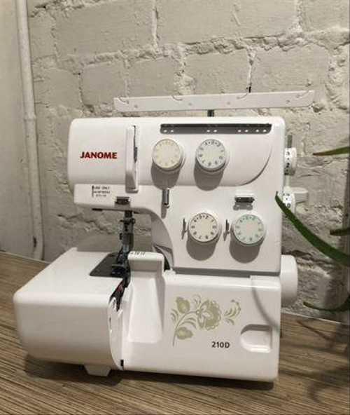 Оверлок Janome 210d