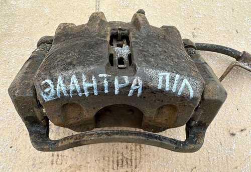 Суппорт передний левый Hyundai Elantra XD