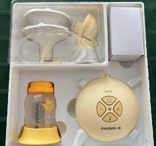 Молокоотсос Medela swing flex