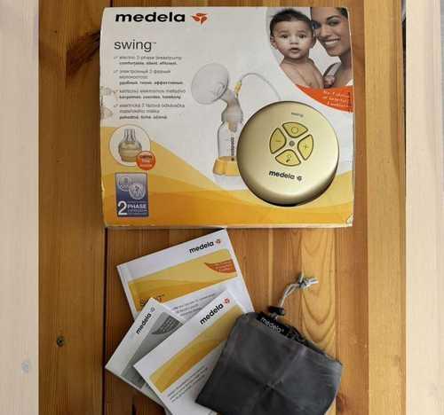 Молокоотсос электрический medela swing