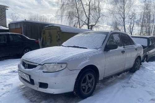 В разборе mazda 323