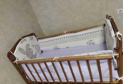 Детская кроватка с бортами