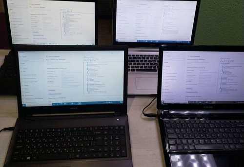 Четыре офисных ноутбука