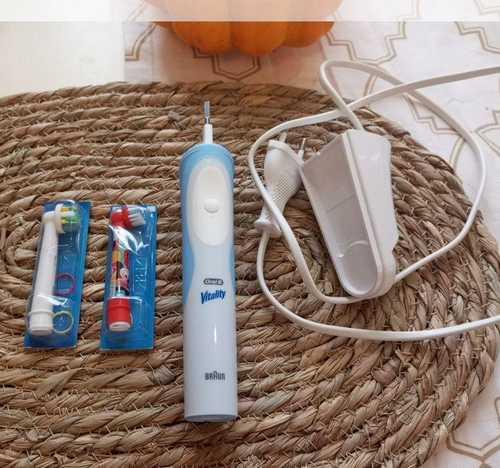 Электрическая зубная щетка oral b vitality