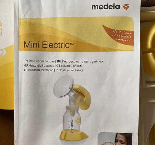 Молокоотсос medela электрический