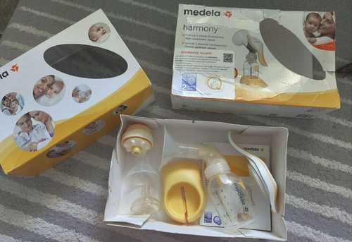 Молокоотсос medela ручной +соска