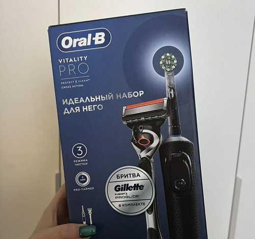 Электрическая зубная щетка oral b vitality pro