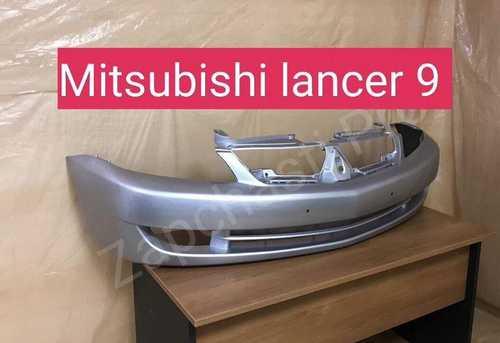 Передний бампер Mitsubishi Lancer 9 серебро 2009