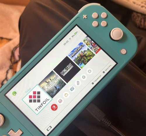 Nintendo switch lite прошитая с играми