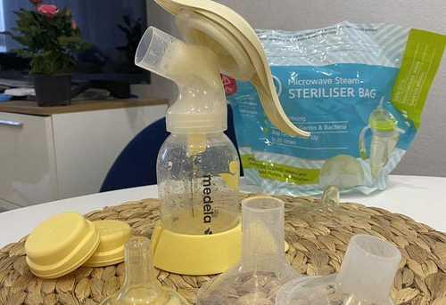 Молокоотсос medela ручной, + соска, воронка