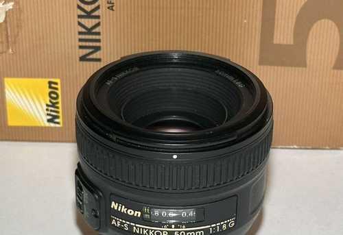 Nikon 50mm f/1.8G (коробочный комплект)