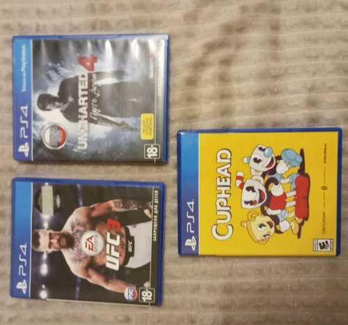 Диски на ps4 cuphead, uncharted 4, ufc3