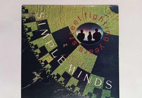 LP Simple Minds - Street Fighting Years UK 1989г