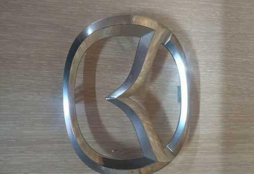 Эмблема решетки радиатора mazda 3