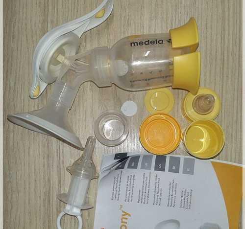 Молокоотсос medela ручной