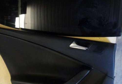 Дверная обшивка (карта) на VW Passat B6