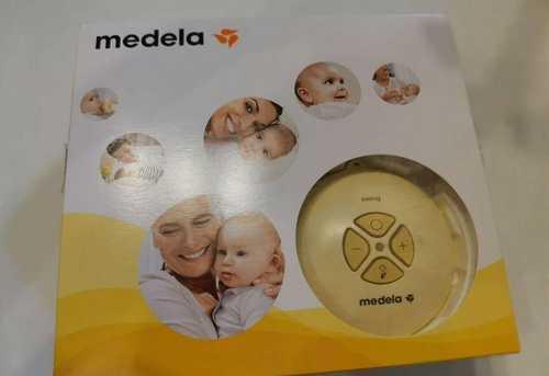 Электрический молокоотсос medela