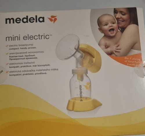 Молокоотсос medela электрический