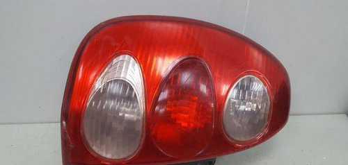 Фонарь задний левый Daihatsu Storia M100S EJ 1Л